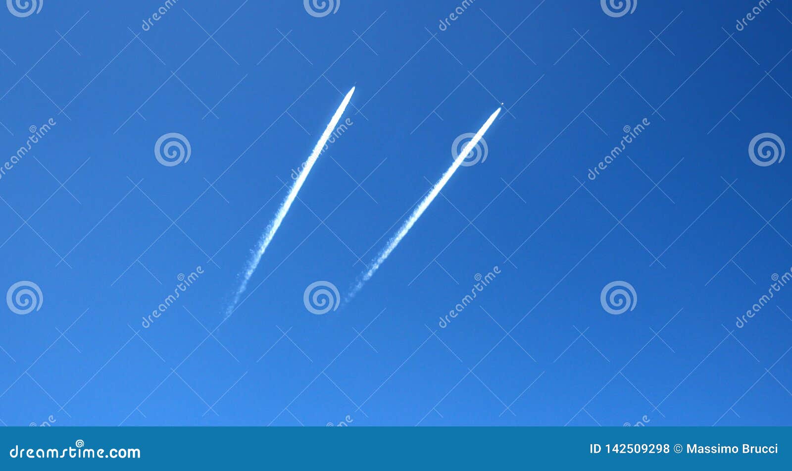 Trails of Airplanes in Flight Stock Photo - Image of arrow, boeing ...
