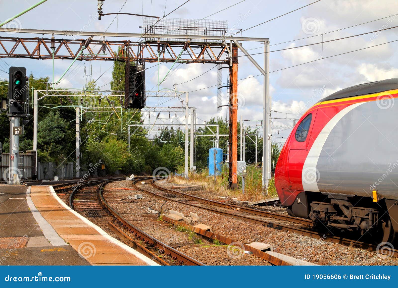 Train pulling into station stock photo. Image of pulling - 19056606