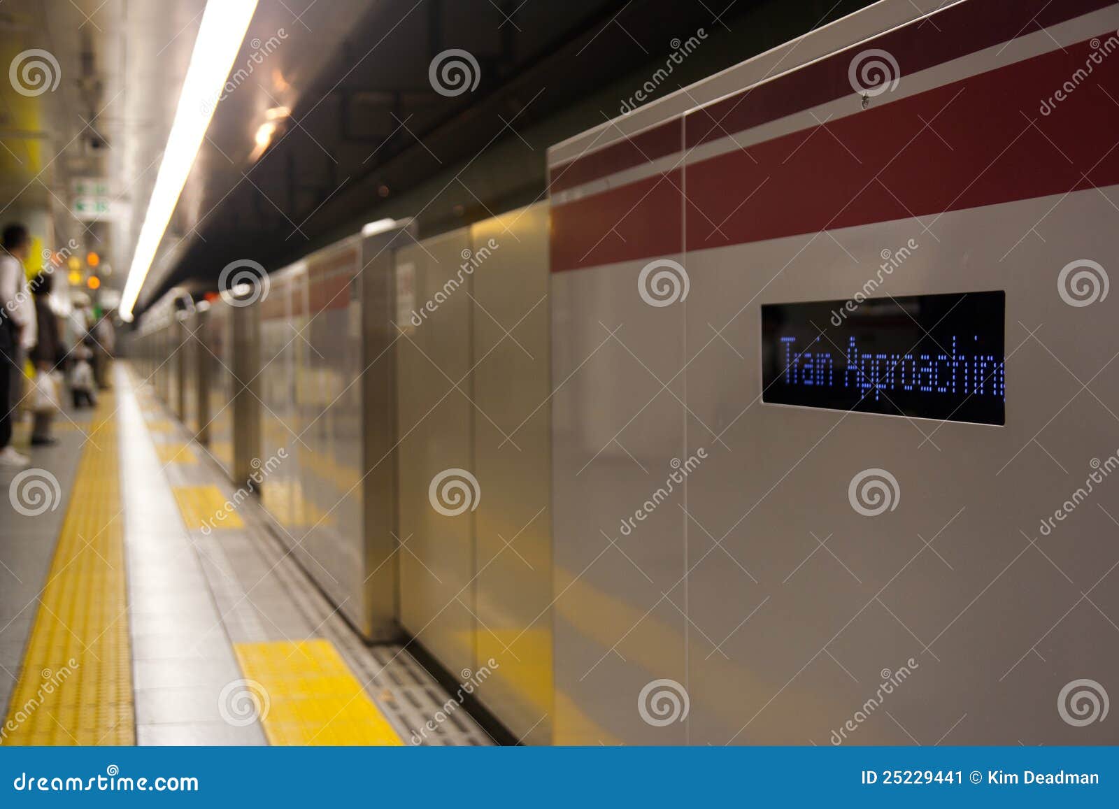 Train approaching barrier stock image. Image of safety - 25229441