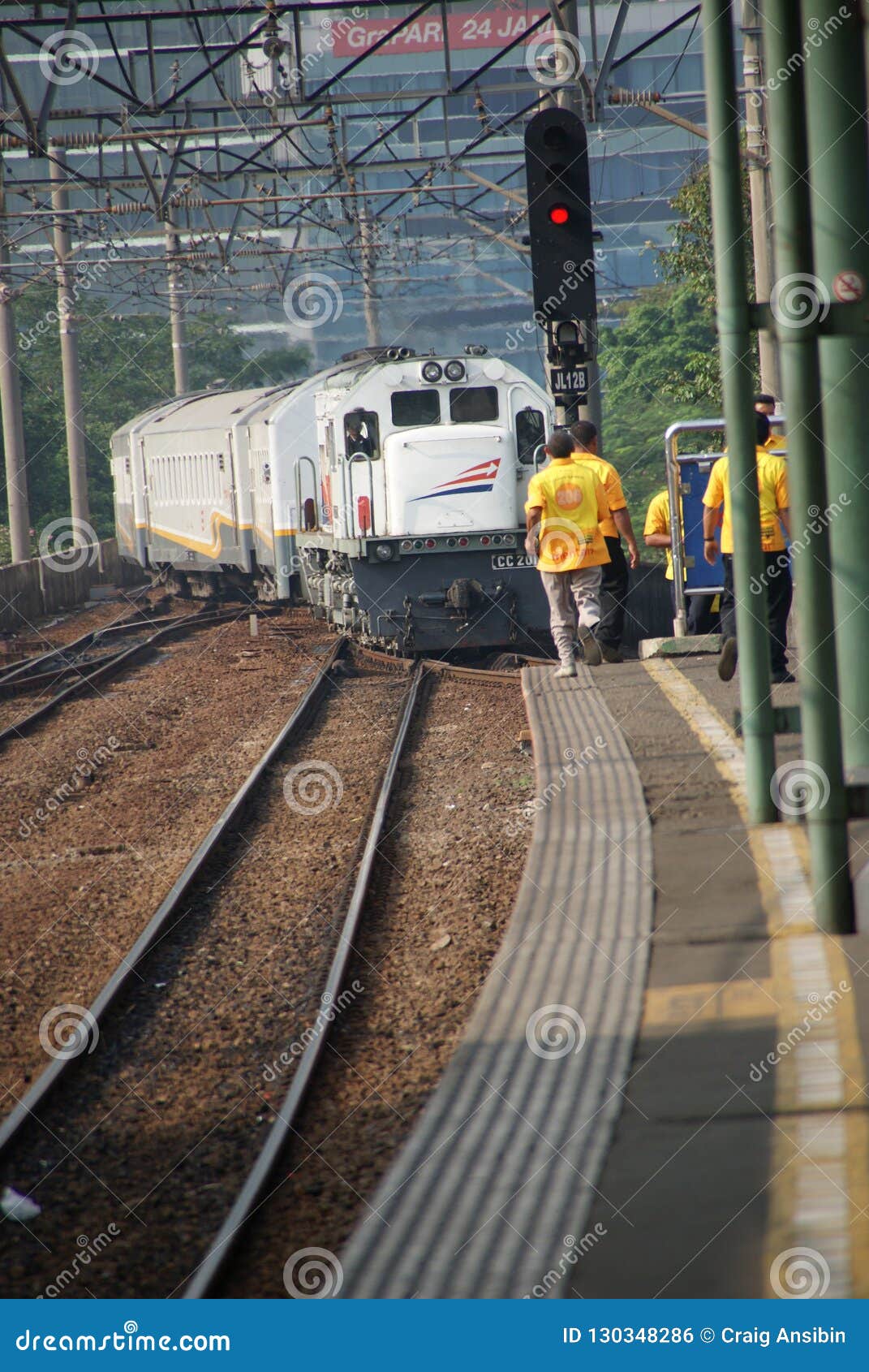 A Train Approaching Station Platform in Jakarta, Indonesia Editorial ...