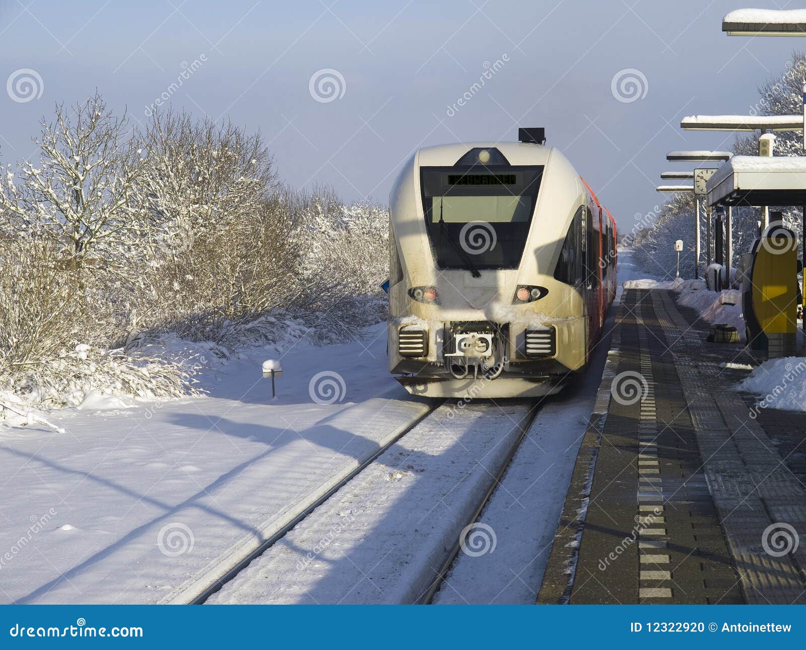 Train Arriving At The Railway Station Stock Photo - Image of ticket ...