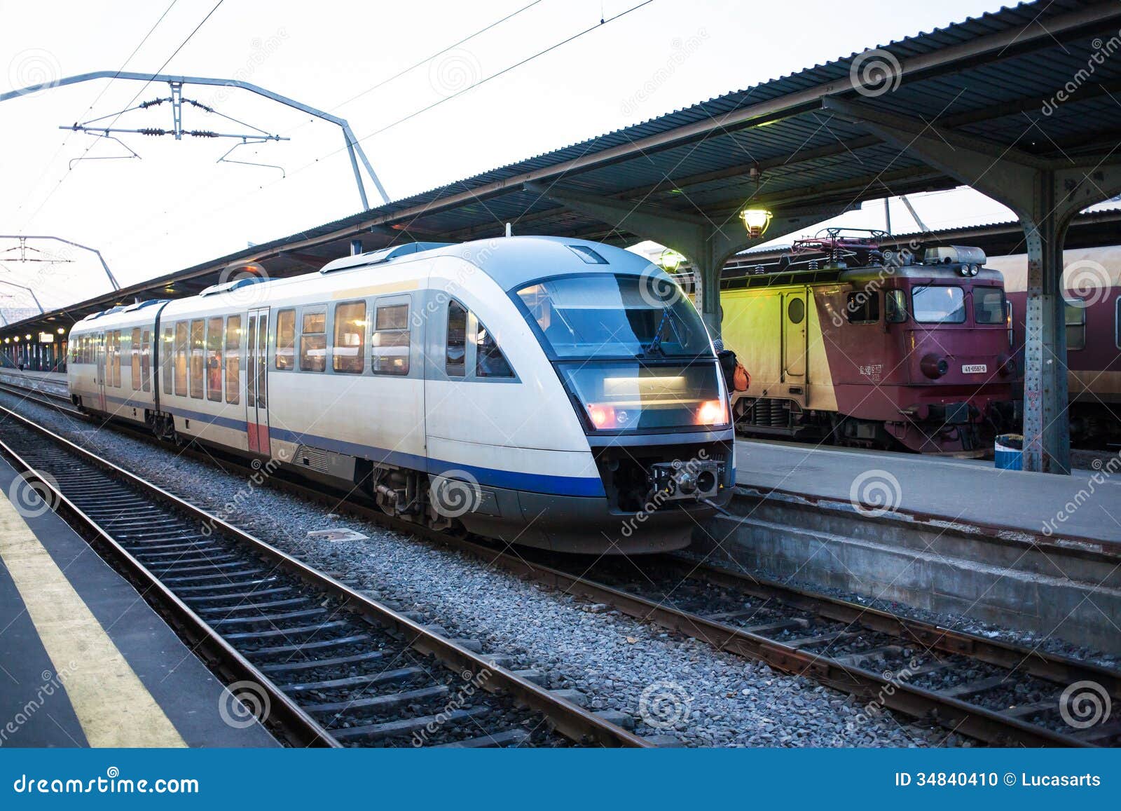 Train arriving in station stock photo. Image of rail - 34840410