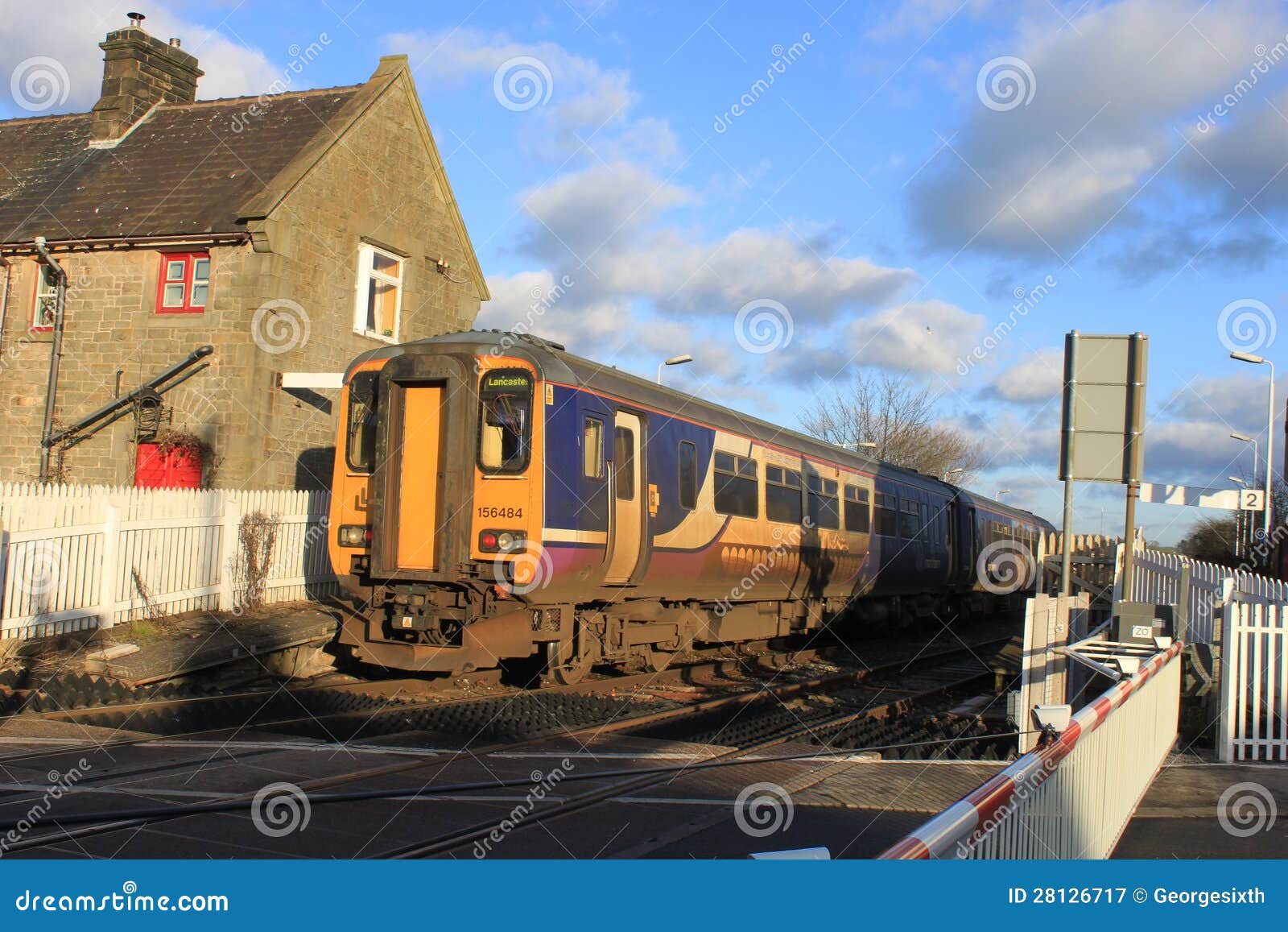 Train at Bare Lane Level Crossing and Station Editorial Photography ...