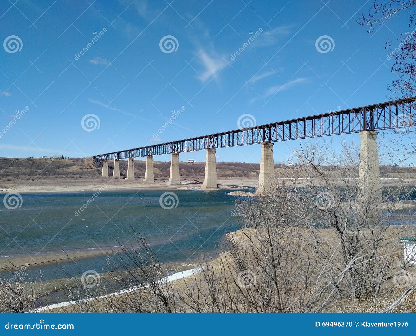 Train bridge above river stock photo. Image of bridge - 69496370