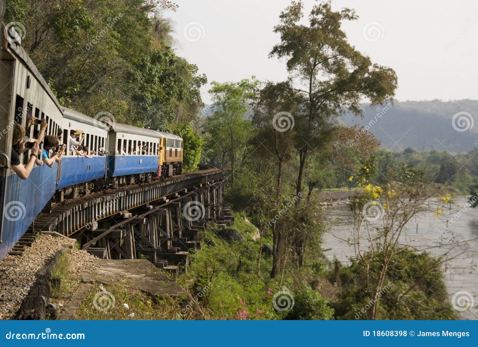 Train on Bridge over River editorial stock photo. Image of ...
