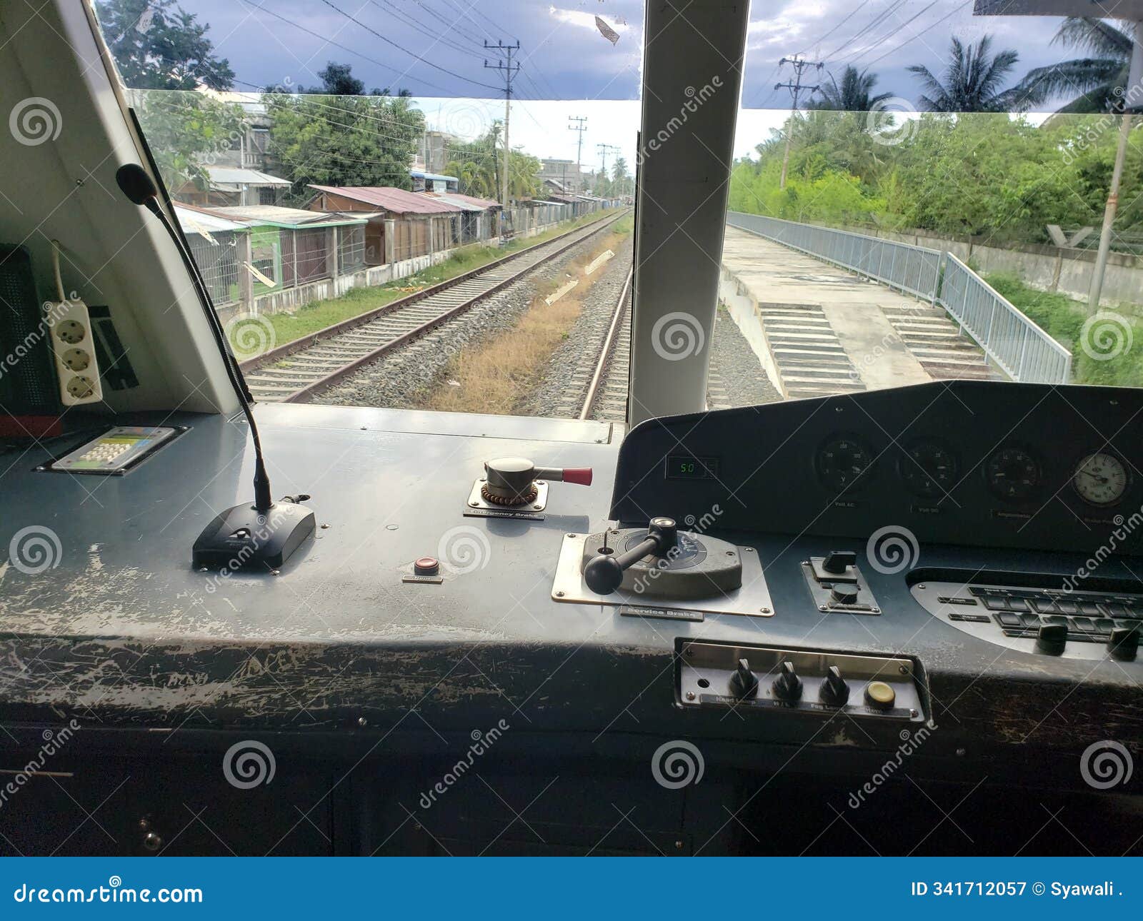 Train Cab Interior with View of Tracks and Suburbs Stock Image - Image ...