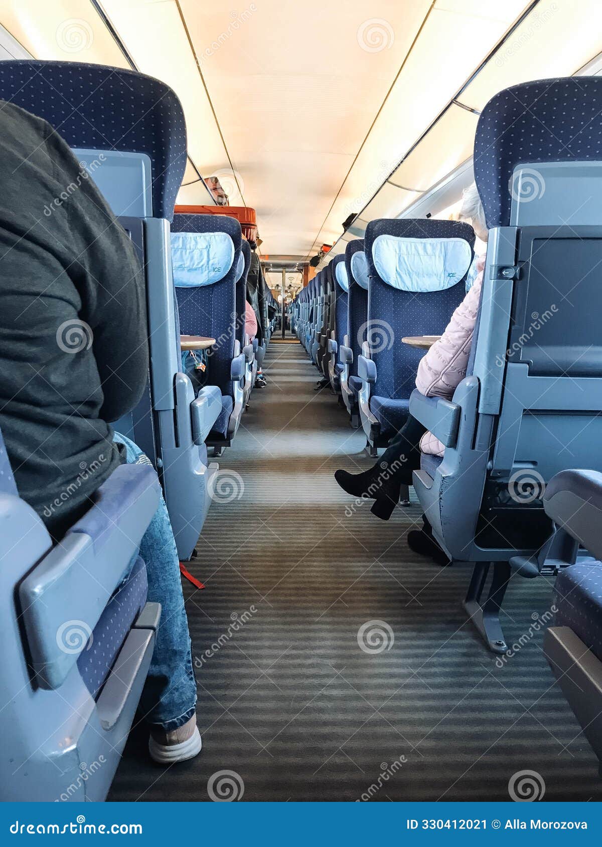 A Train Car with People Sitting in it Stock Image - Image of crew ...