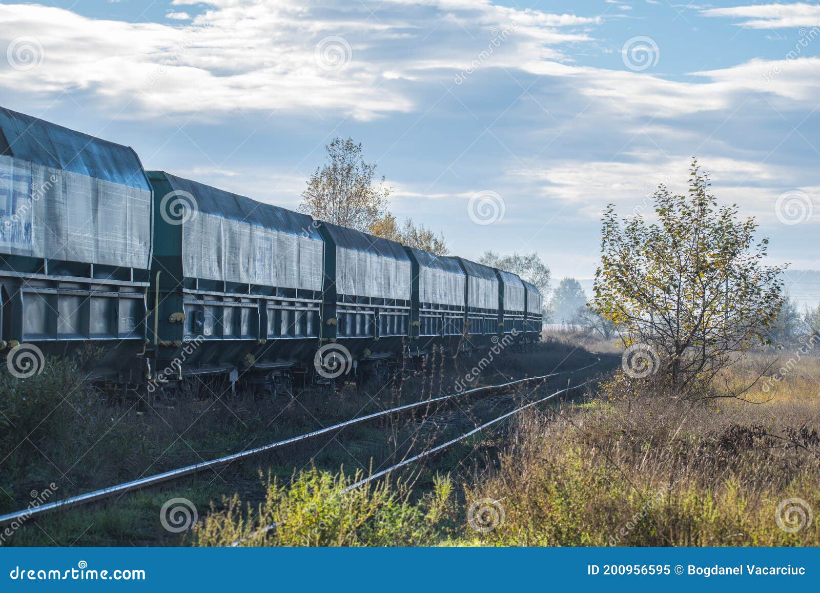Train Carrying Coal or Sand. Wagons on the Railway Stock Image - Image ...