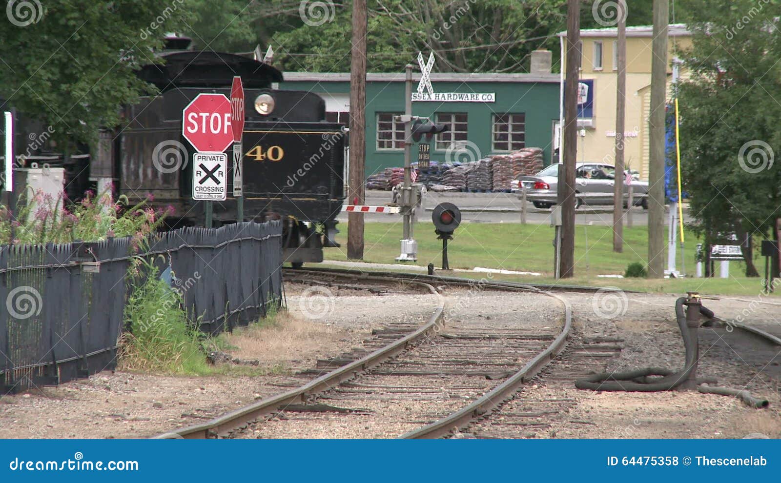 Train Coming Around the Corner at an Intersection Stock Footage - Video ...