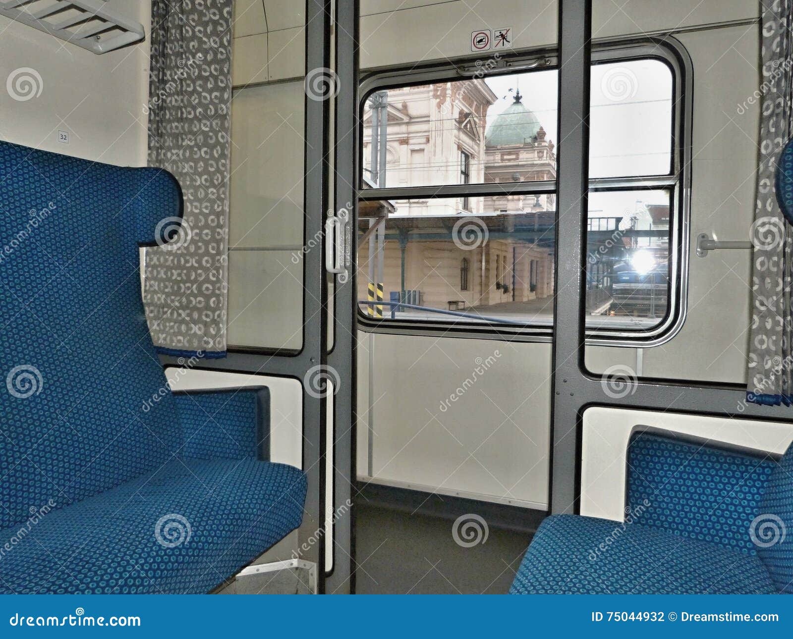 Train Compartment in Blue at the Station Stock Photo - Image of ...