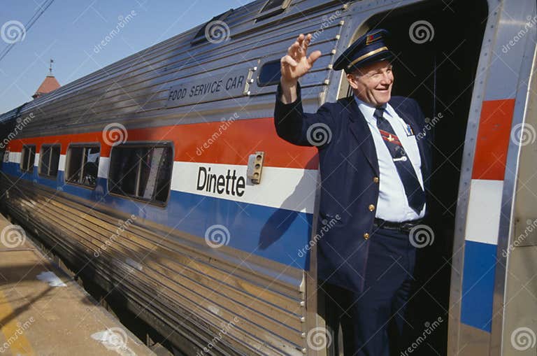 Train Conductor Waving on Train Editorial Photo - Image of ...
