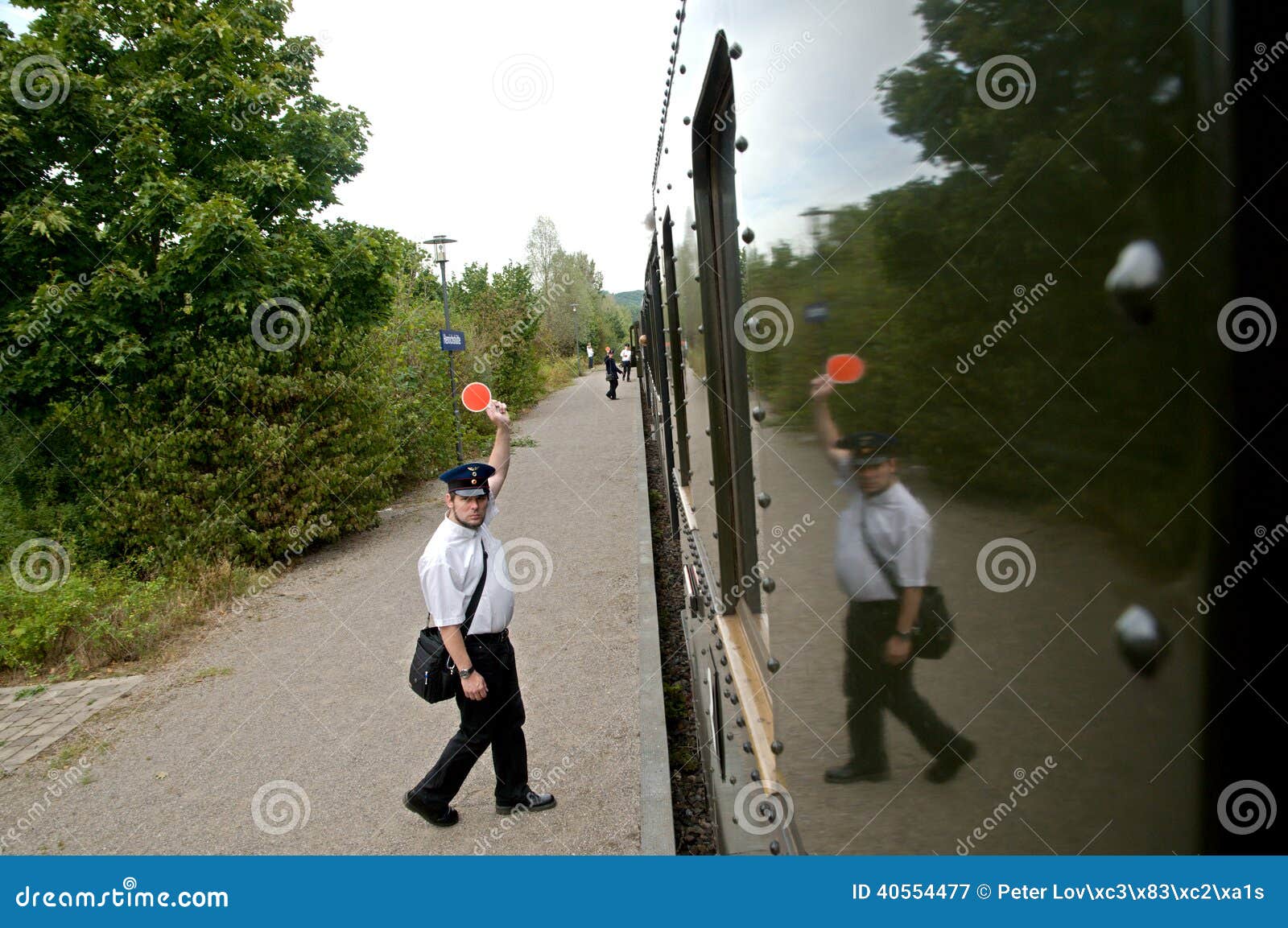 Train Conductor Waving on Train Editorial Photography - Image of ...