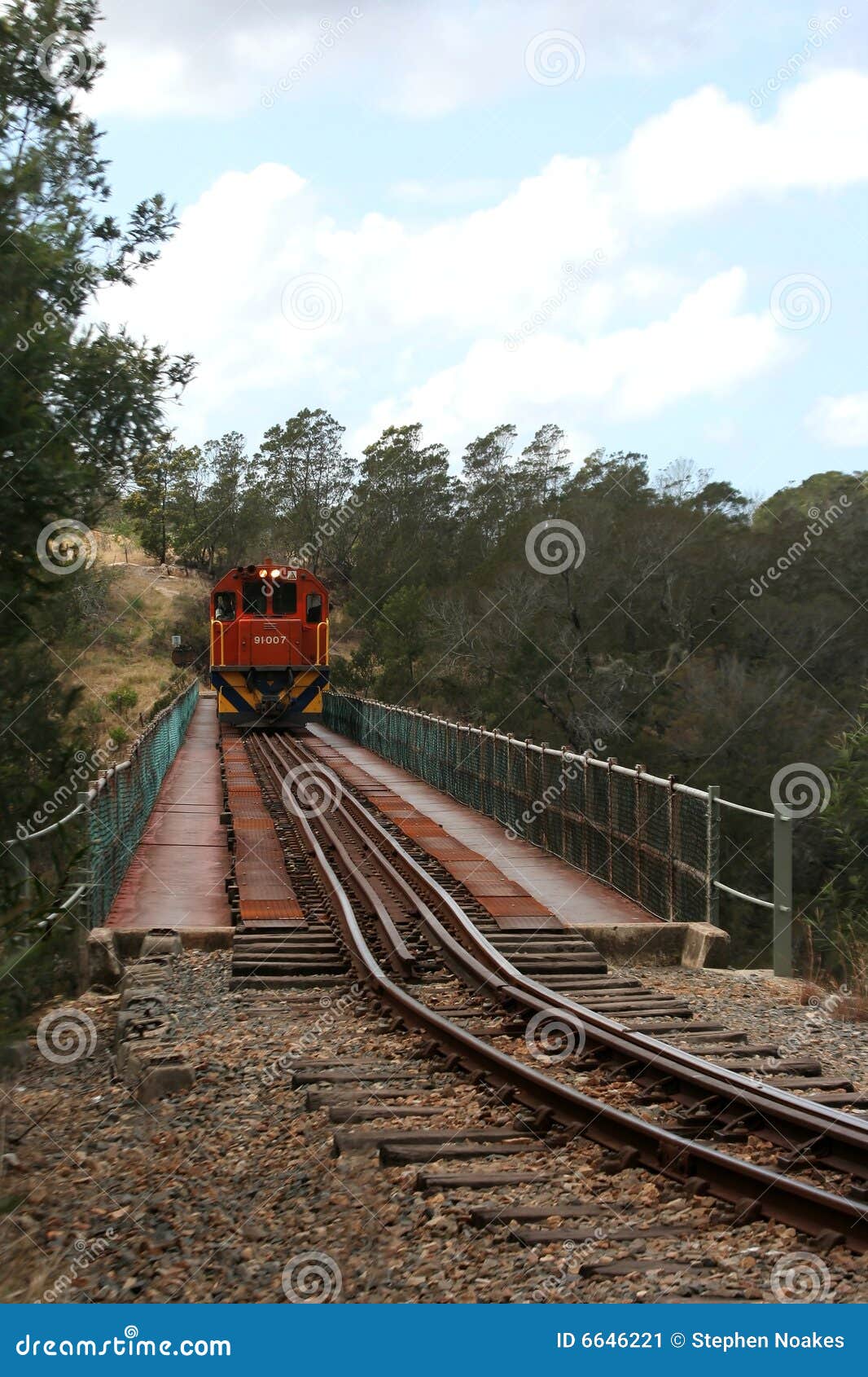 Train crossing bridge stock image. Image of trains, diesel - 6646221