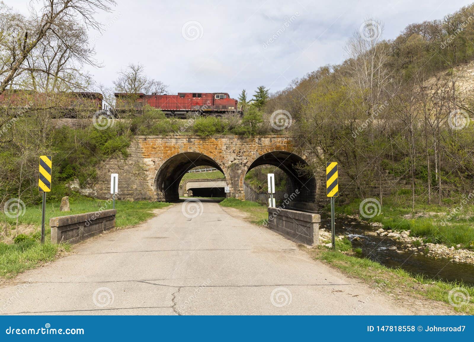 Train Crossing a Stone Arch Bridge Stock Photo - Image of railway ...