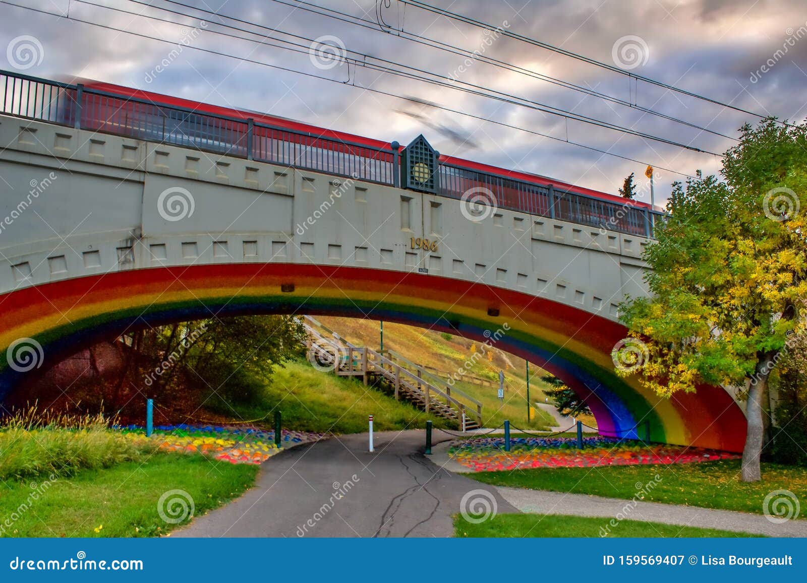 Train Crossing Over the Rainbow Bridge Stock Image - Image of trees ...
