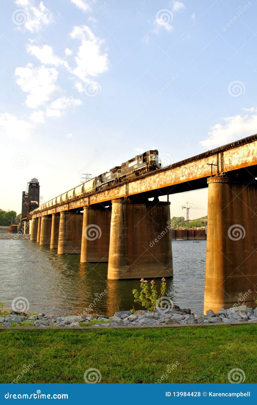 Train crossing the river stock photo. Image of house - 13984428