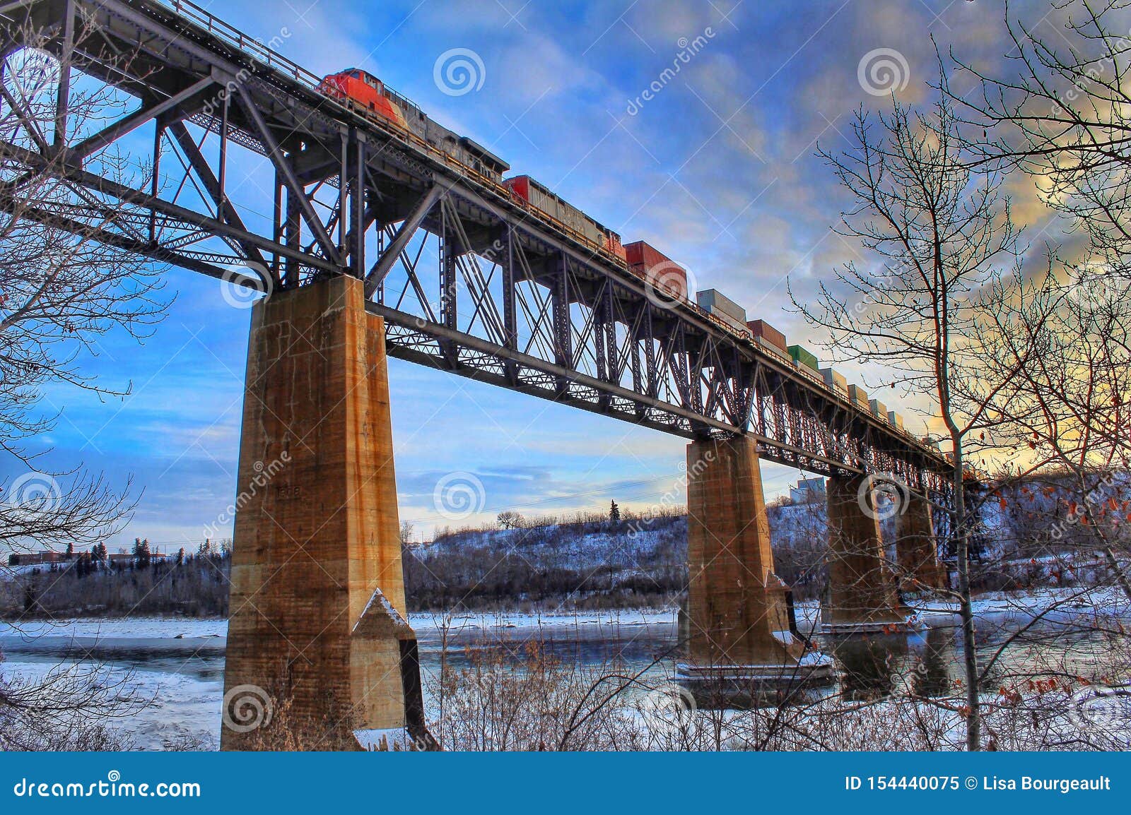 Train Crossing the Tracks Overhead in Winter Stock Image - Image of ...