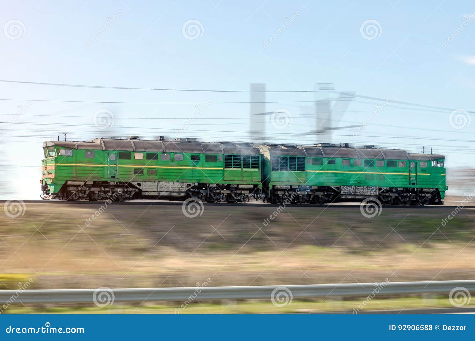 Train Double Locomotive, Green Rides at Speed by Rail. Stock Photo ...