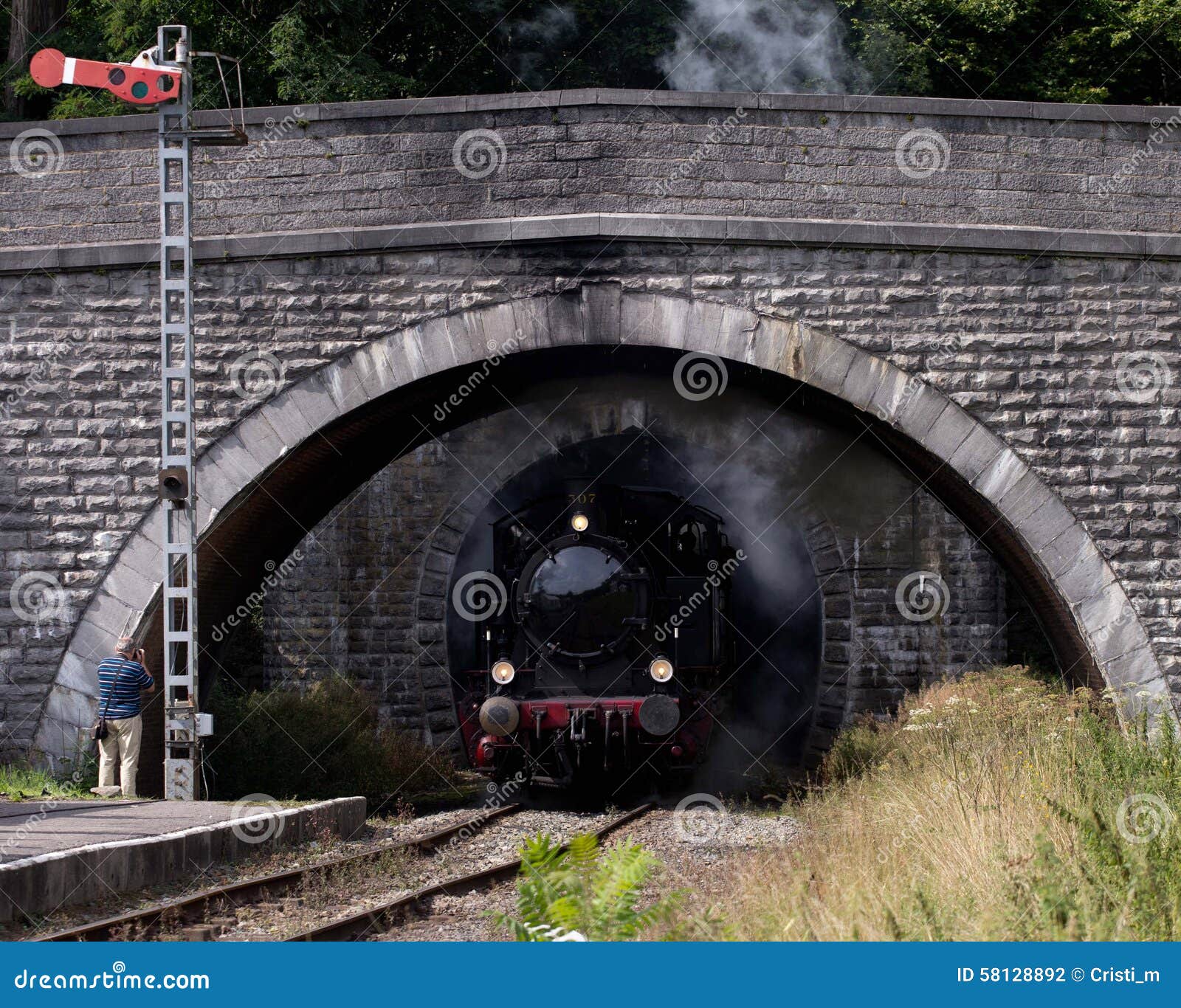 Train exiting the tunnel stock photo. Image of wheels - 58128892