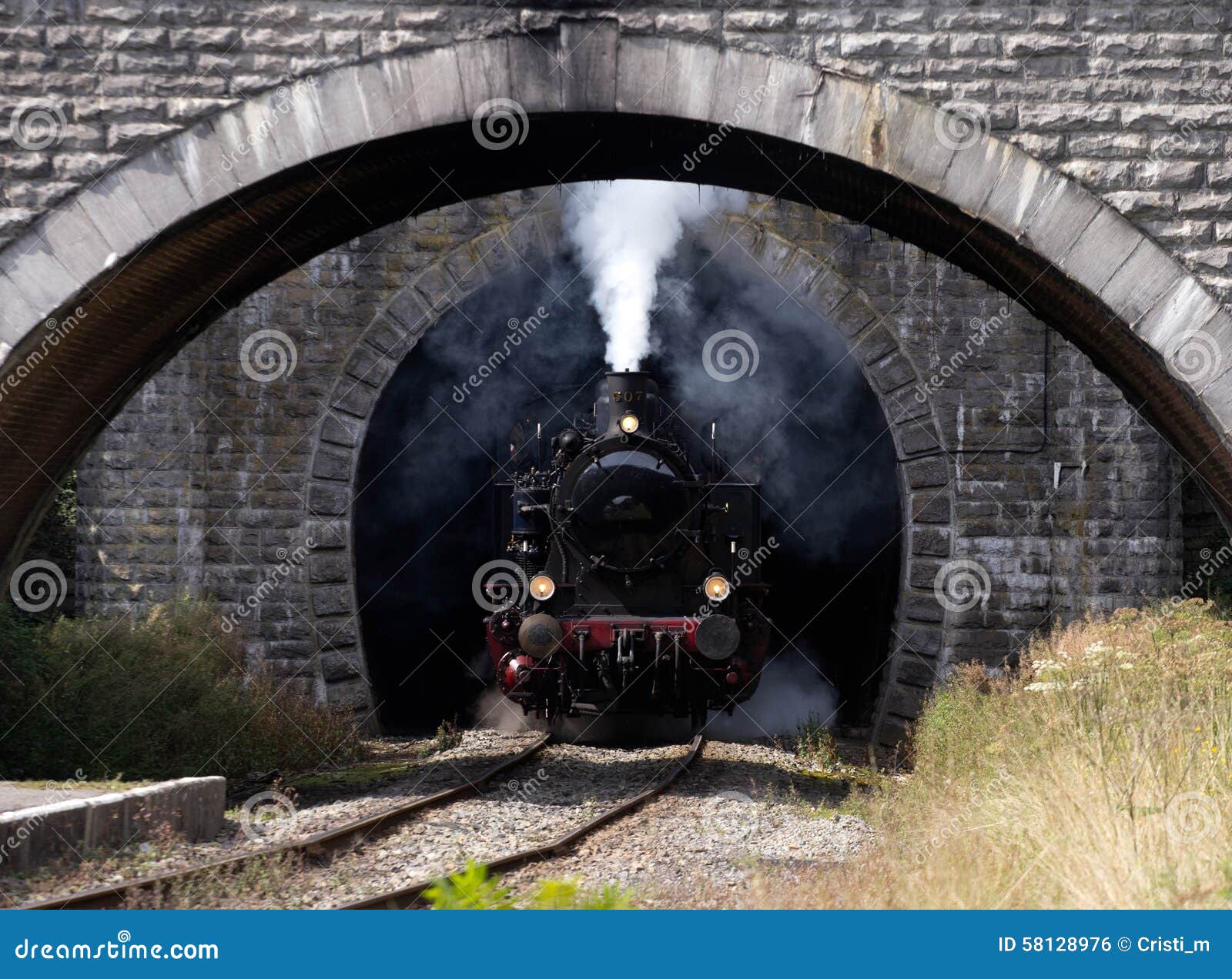 Train exiting the tunnel stock photo. Image of travel - 58128976