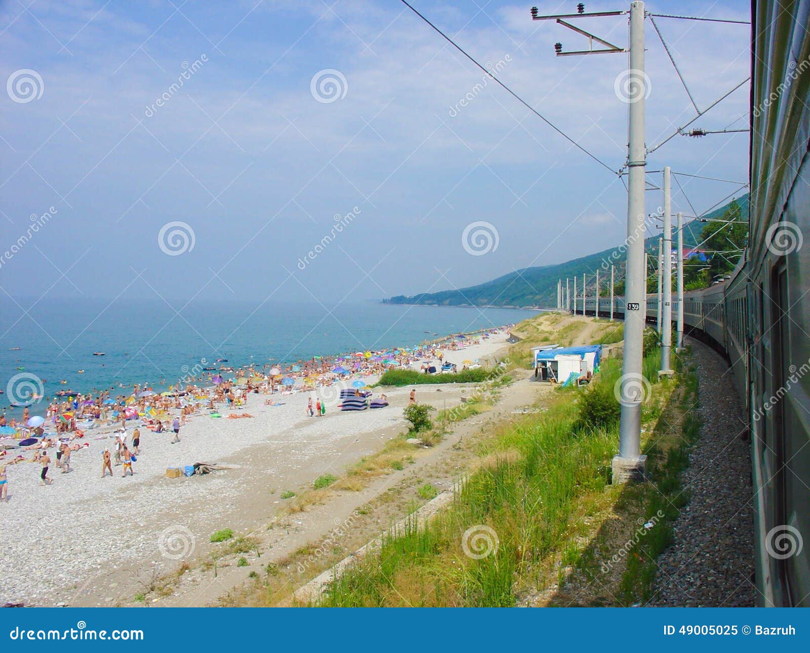The Train Goes by the Sea, a Beach, People Stock Image - Image of beach ...