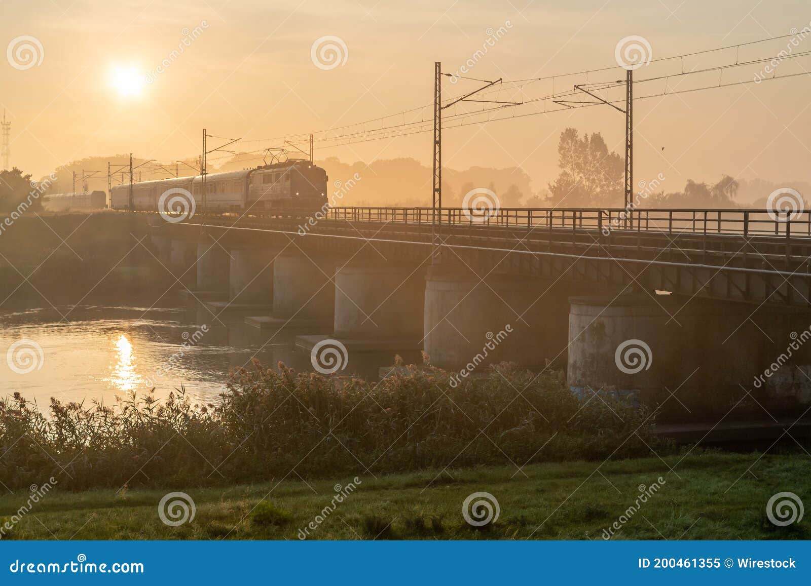 Train Going Over a Bridge at Sunrise Stock Image - Image of journey ...