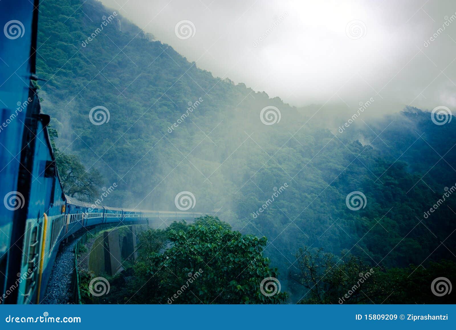 Train between Haze and Rain Stock Image - Image of green, carriages ...