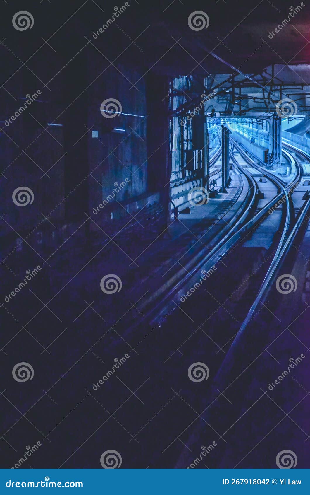 Train on Illuminated Railroad Station Platform at Night Editorial ...