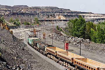 Train at the Iron Ore Opencast Mine is Going for Loading Stock Photo ...