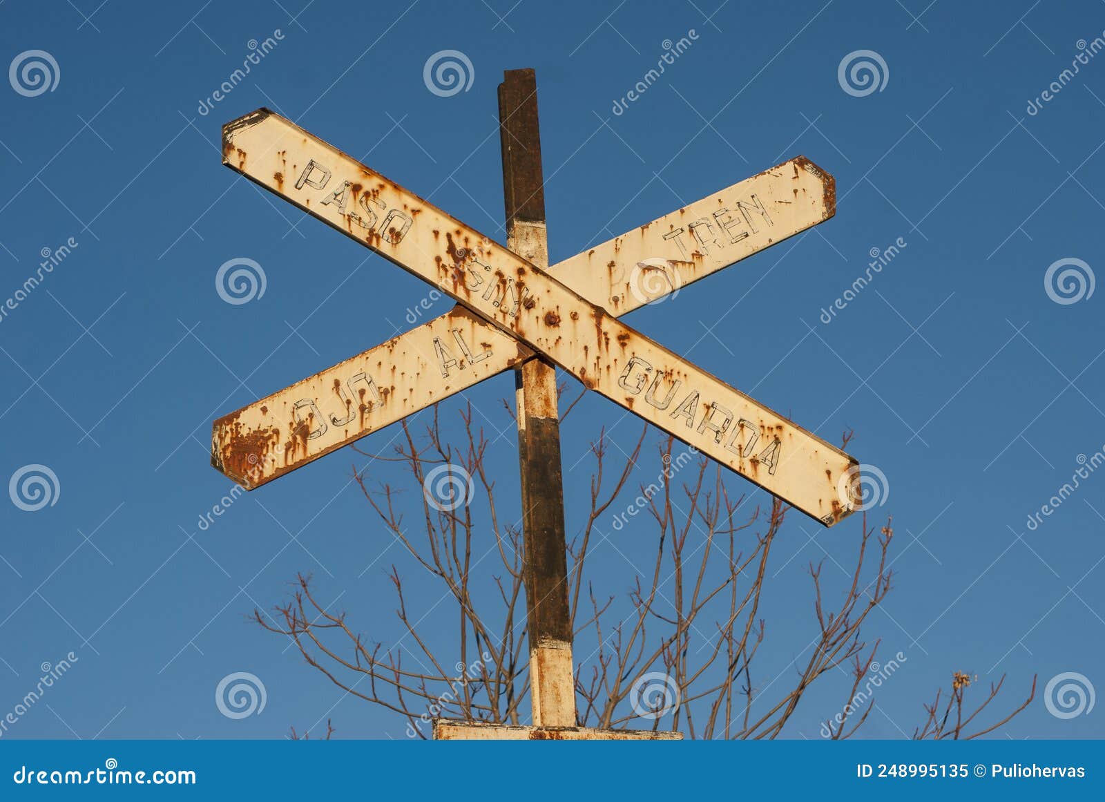 Train Level Crossing Sign with Blue Sky in Horizontal Stock Image ...