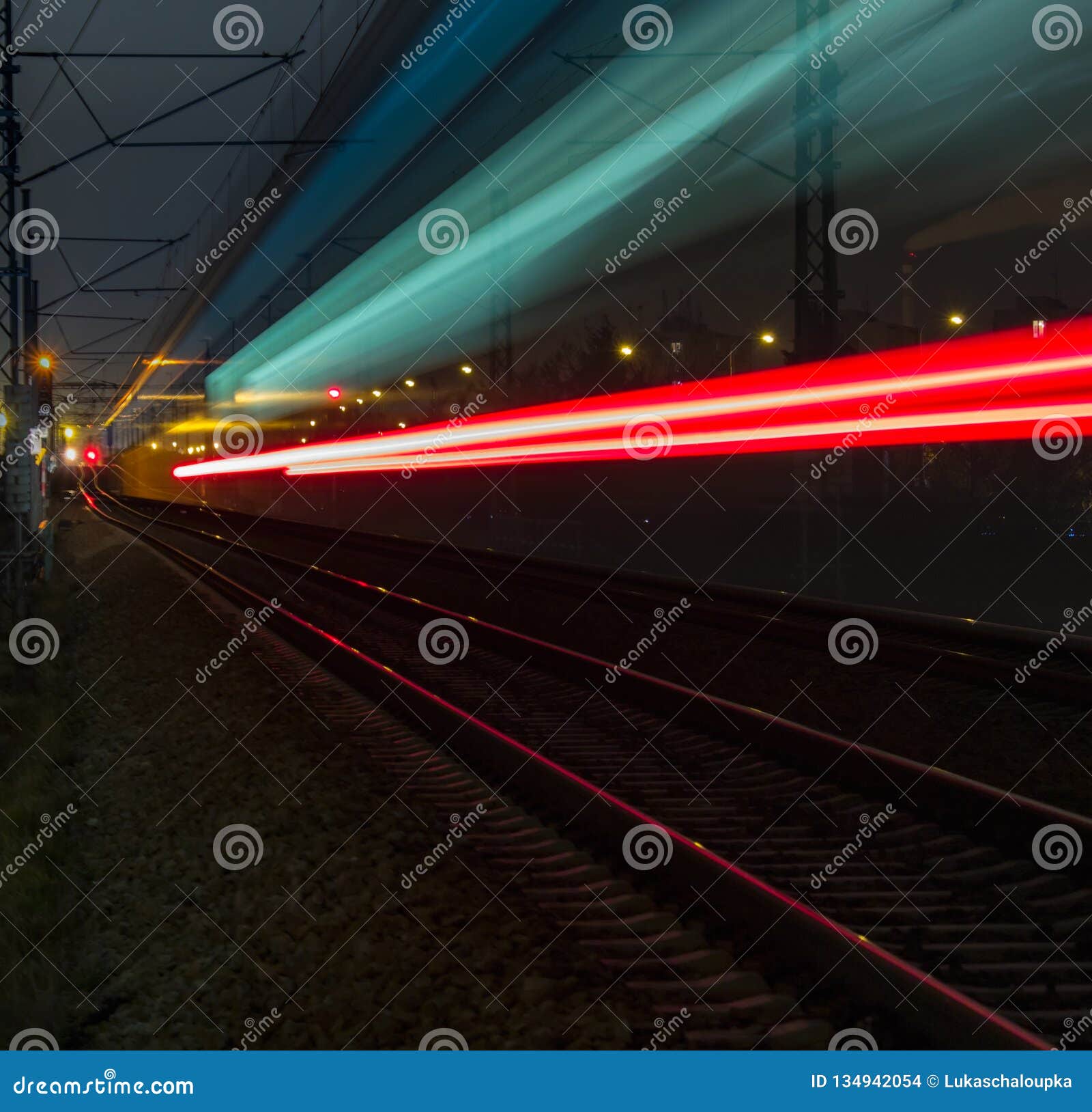 Train Light Trail with Red and Blue Light, Long Exposure Stock Photo ...
