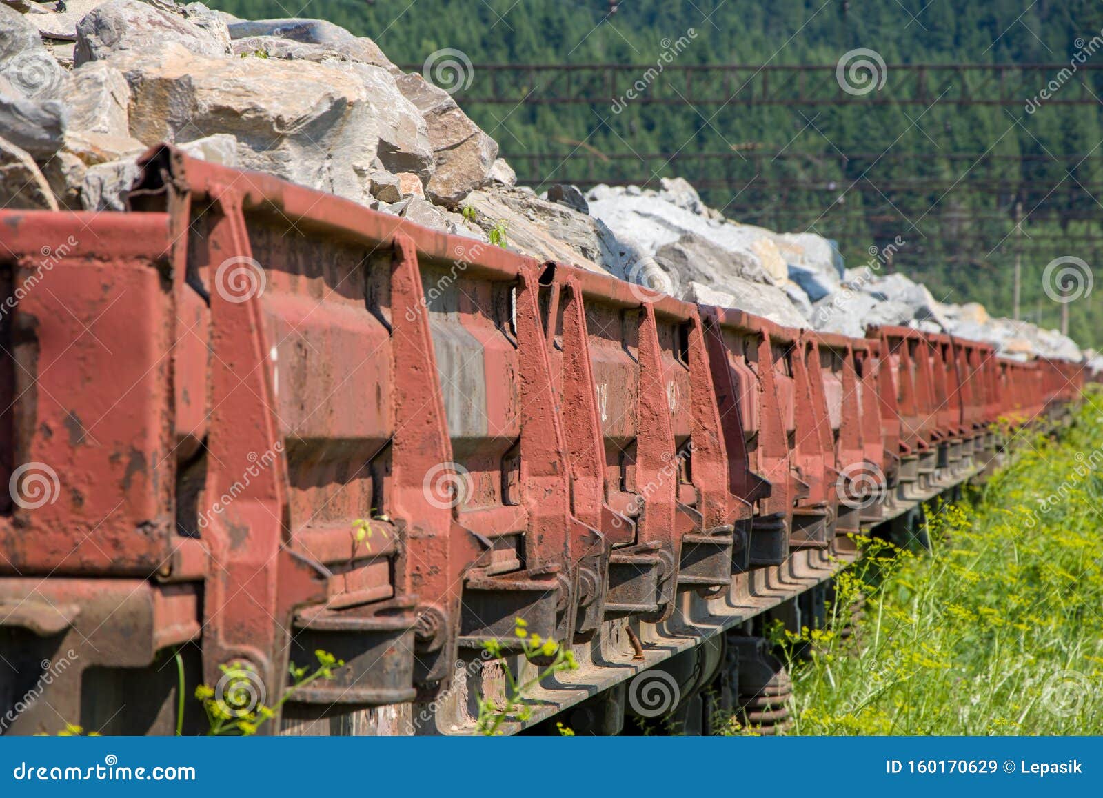 The Train Loaded with Stones and Minerals is on the Siding. Mining and ...
