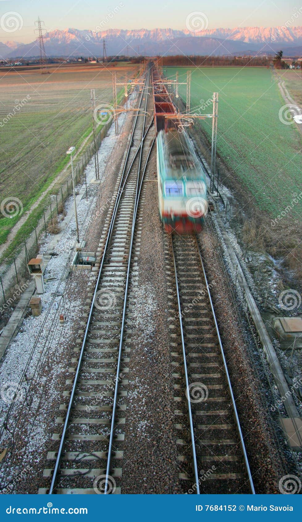 Red Train In Motion. Side View Of The Moving Train Runs On Railway In ...