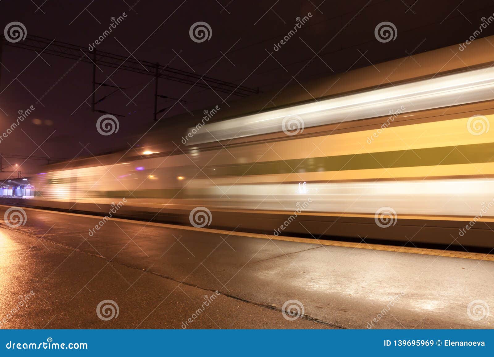 Train in Motion on the Station at Night, Long Exposure Photo Stock ...