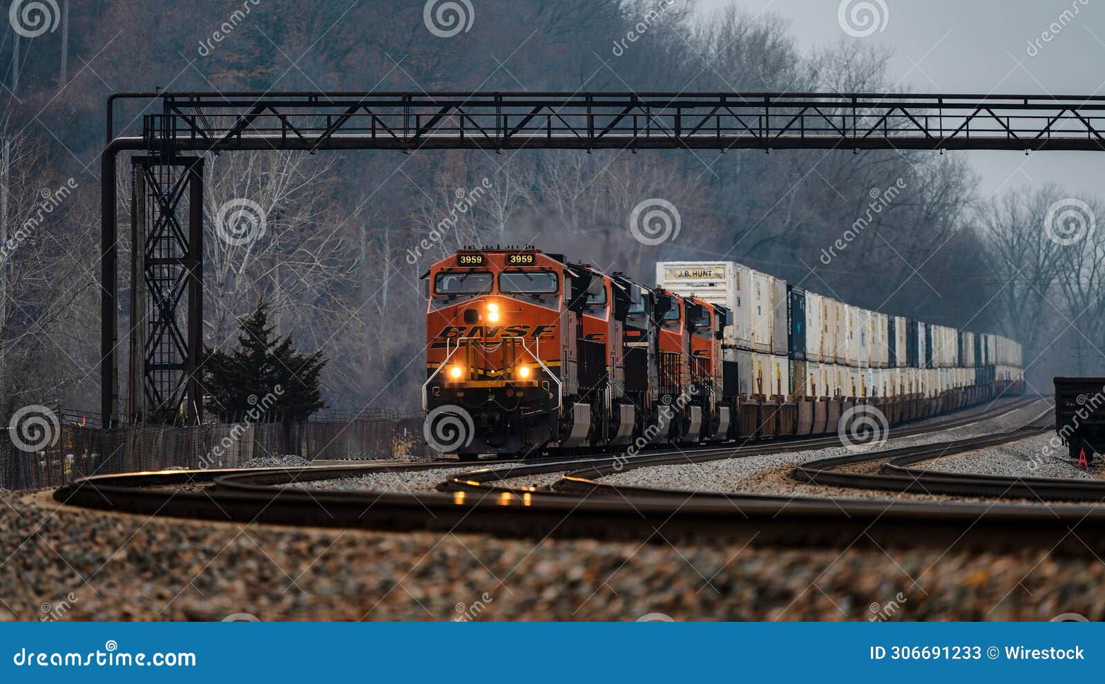 Train Moving Down Tracks at Dusk during the Day Time, Editorial Stock ...