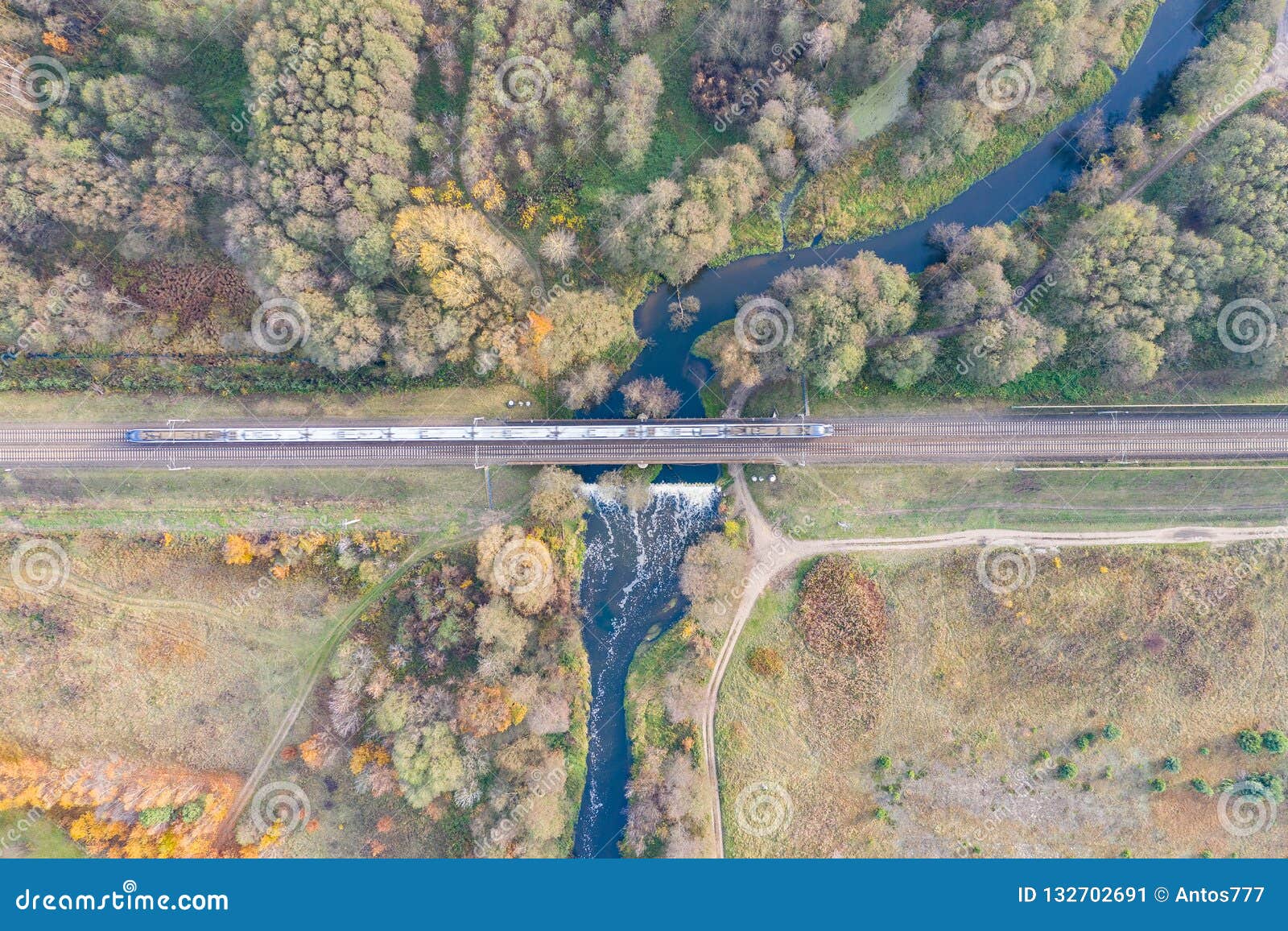 The Train Passes Over the Bridge Over the River Stock Image - Image of ...