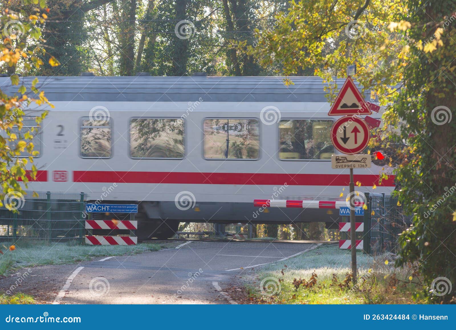 Train passing by stock photo. Image of stop, road, railroad - 263424484