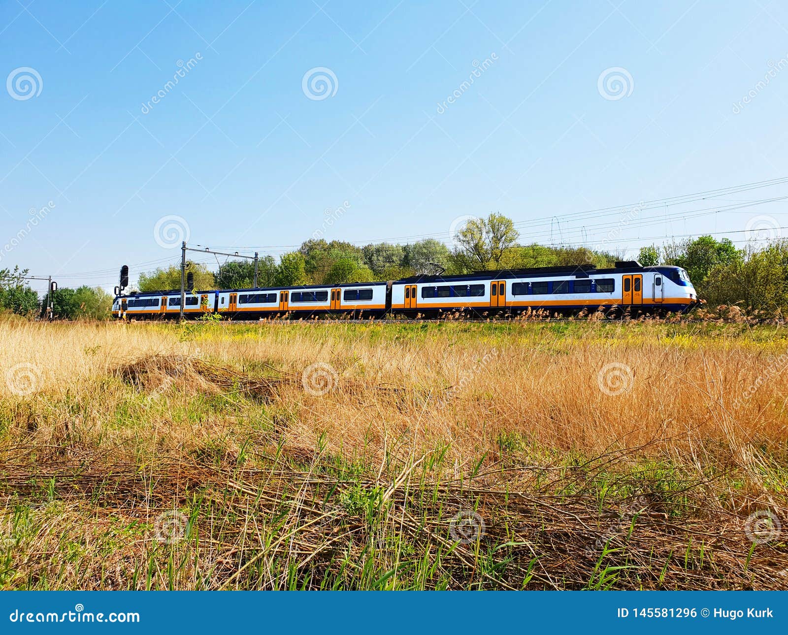 Train Passing in a Open Field Stock Photo - Image of metal, fast: 145581296