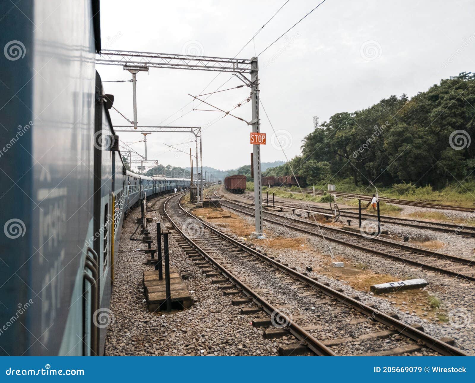 Train Passing in a Railway Station on a Railroad Background Stock Image ...