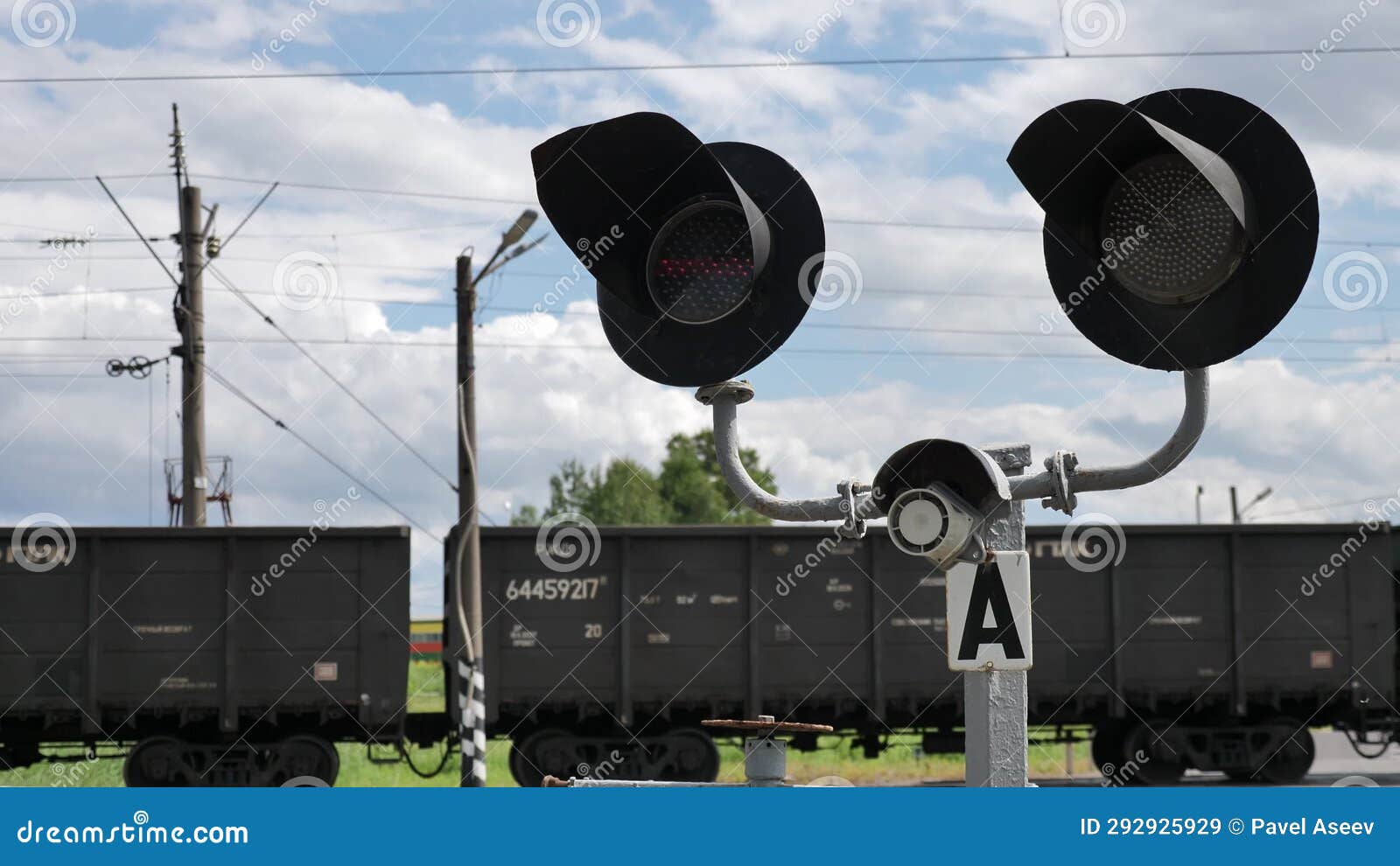 Train Passing Red Traffic Light Flashing at Railroad Crossing. Signs ... Train Passing Red Traffic Light Flashing at Railroad Crossing. Signs ...