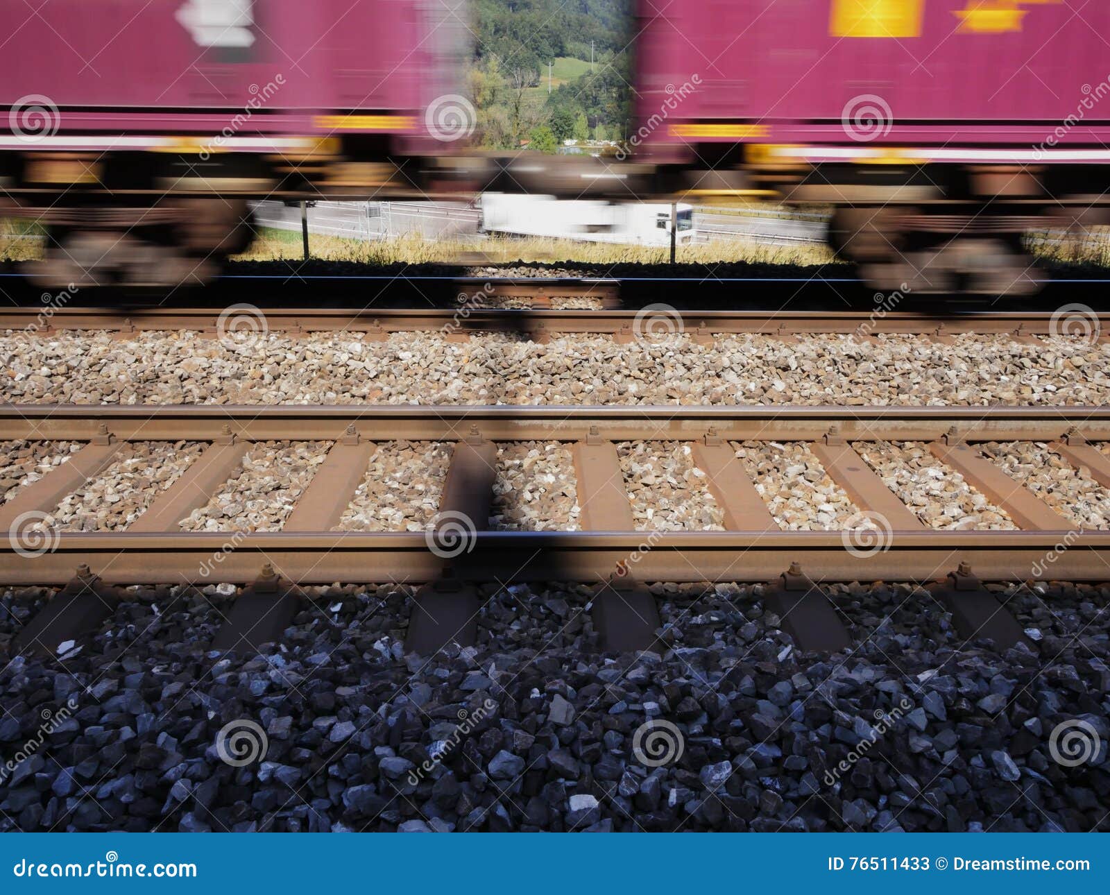 Train is Passing with Speed in Front of a Freeway Stock Image - Image ...