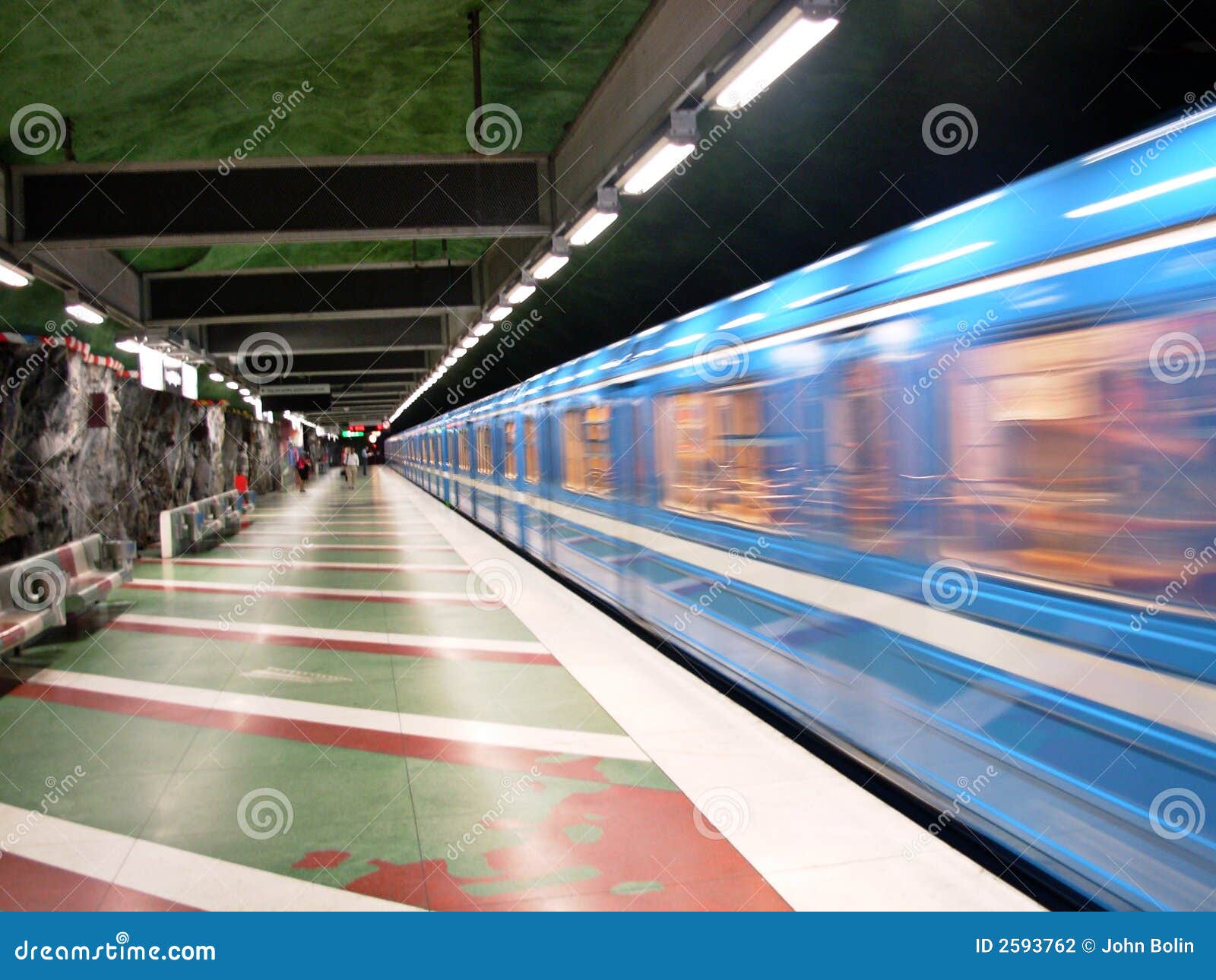 Train Passing through Station Stock Photo - Image of blurry, rail: 2593762