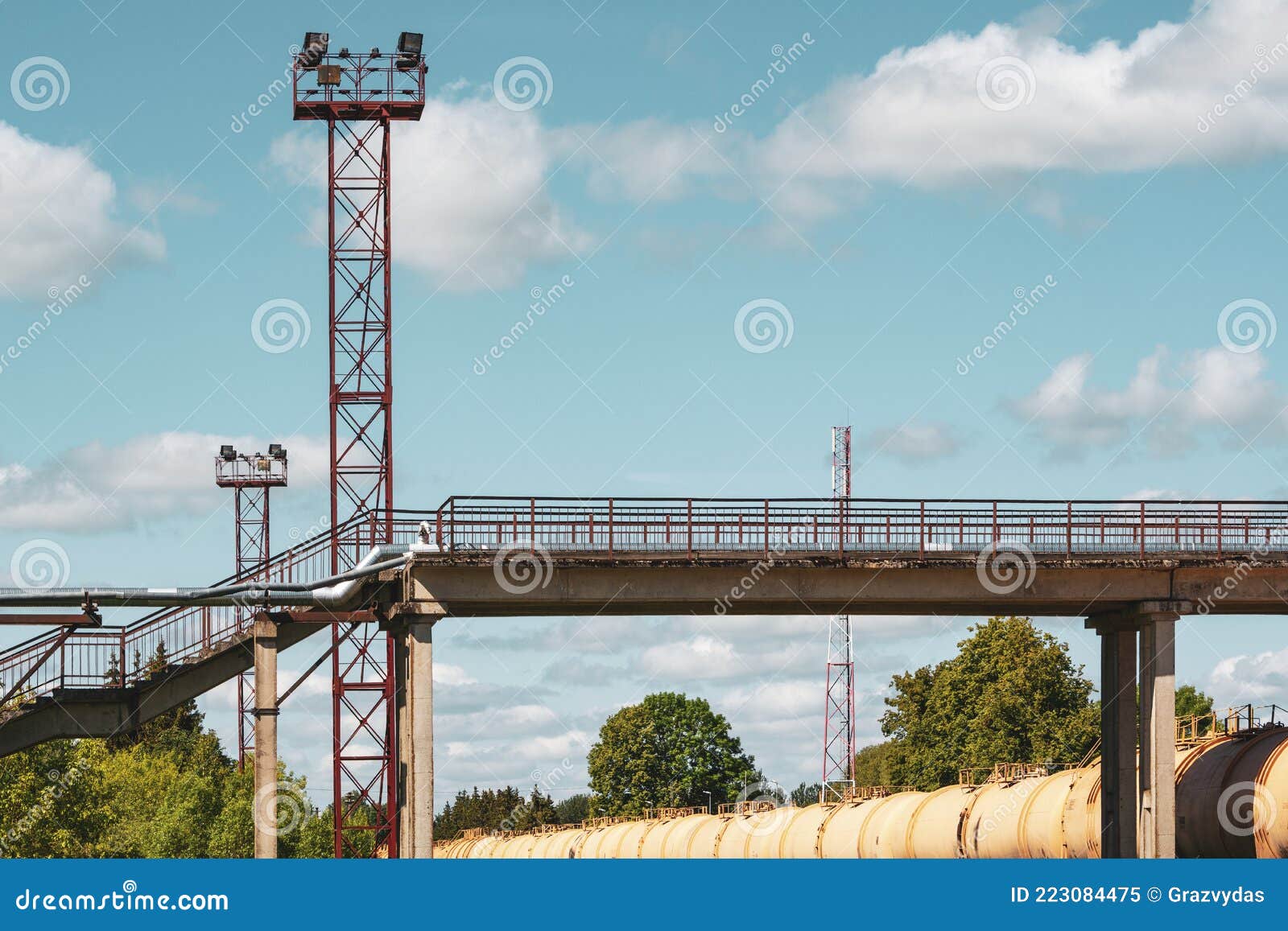 Train with Petroleum Waggons Under Overbridge for Crossing the Railway ...