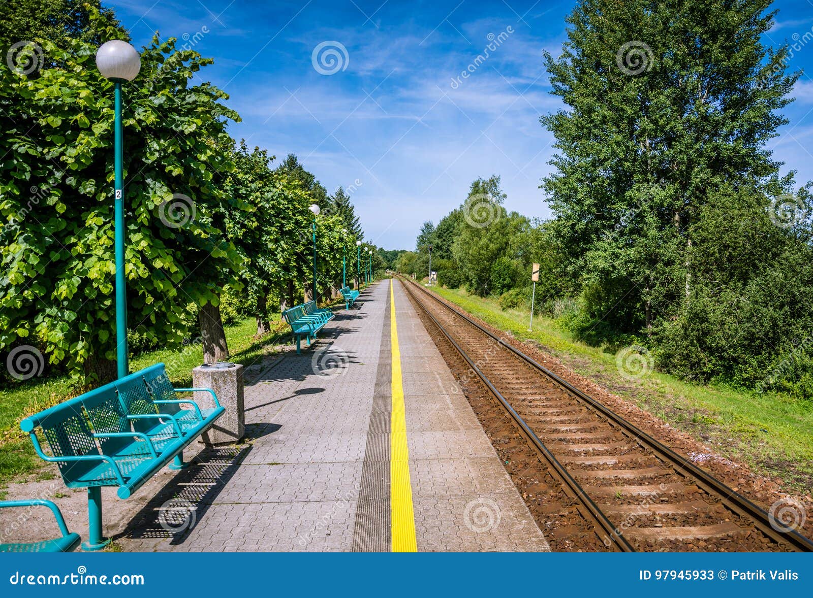 Train Platform with Blue Benches. Stock Image - Image of class ...