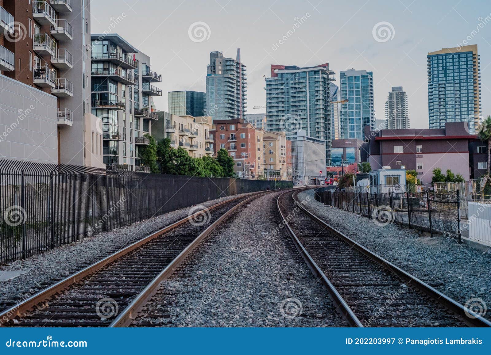 Red Train On Rails/red Train Comes Nearer On Rails. Toned Editorial ...