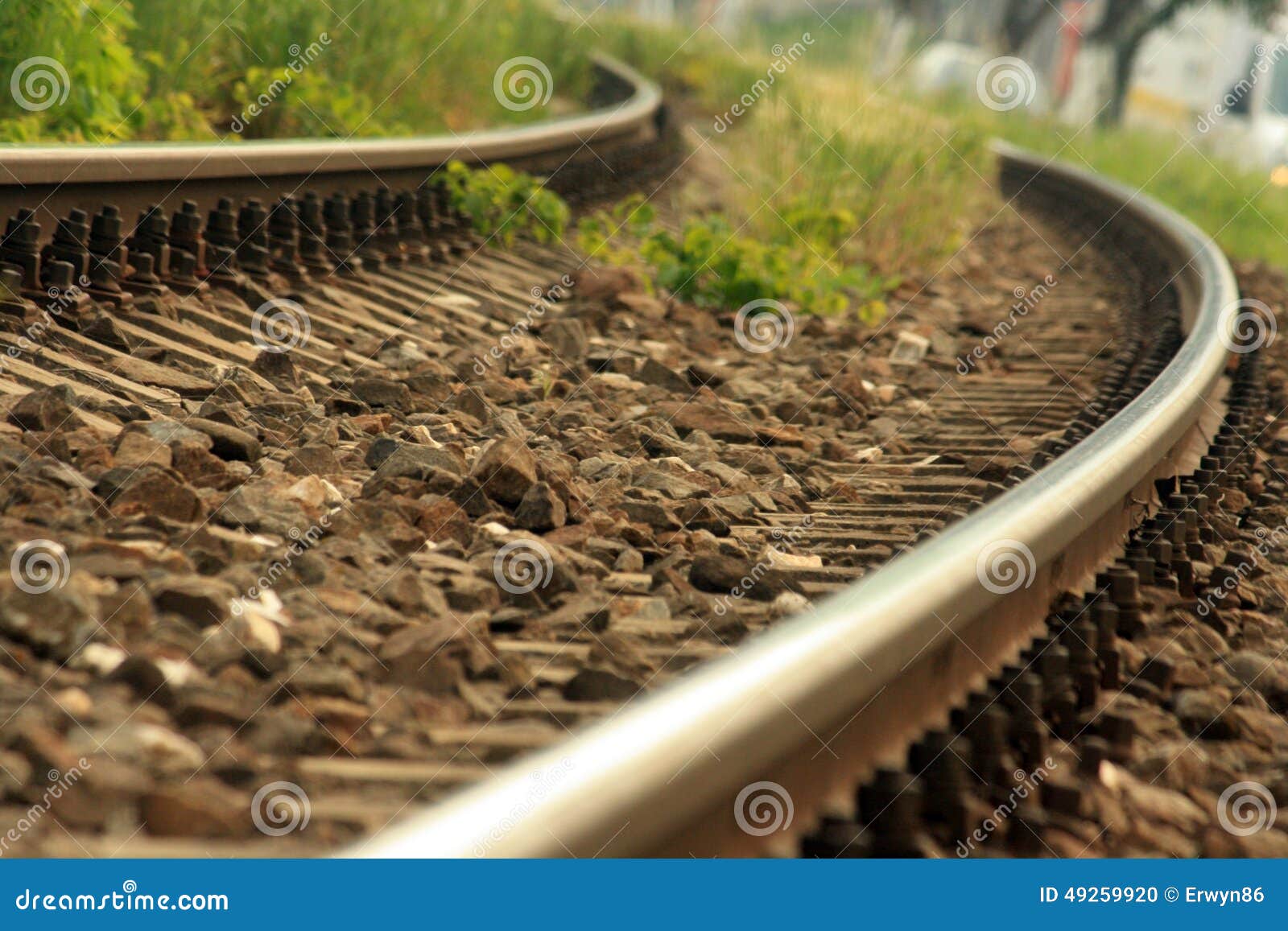 Train rails with rocks stock photo. Image of distance - 49259920