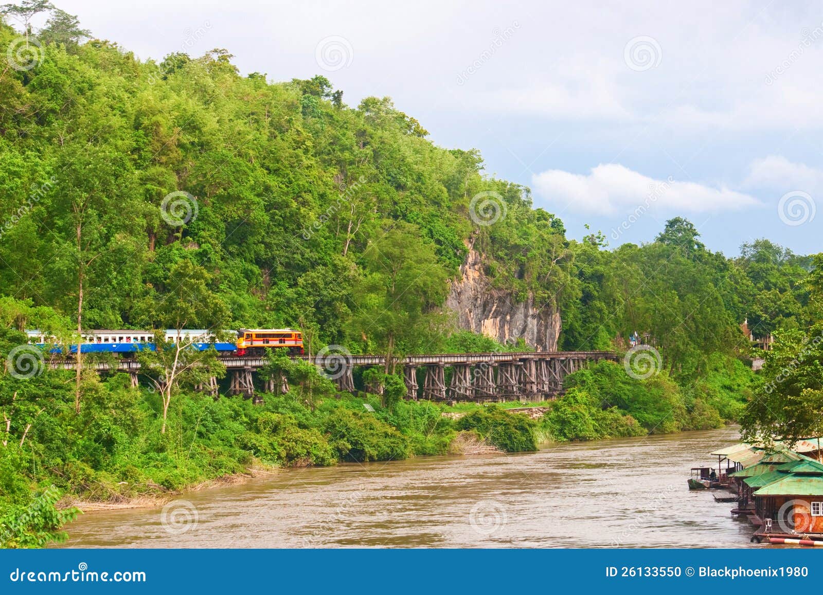 Train and Railway beside Cliff and River Stock Photo - Image of hill ...