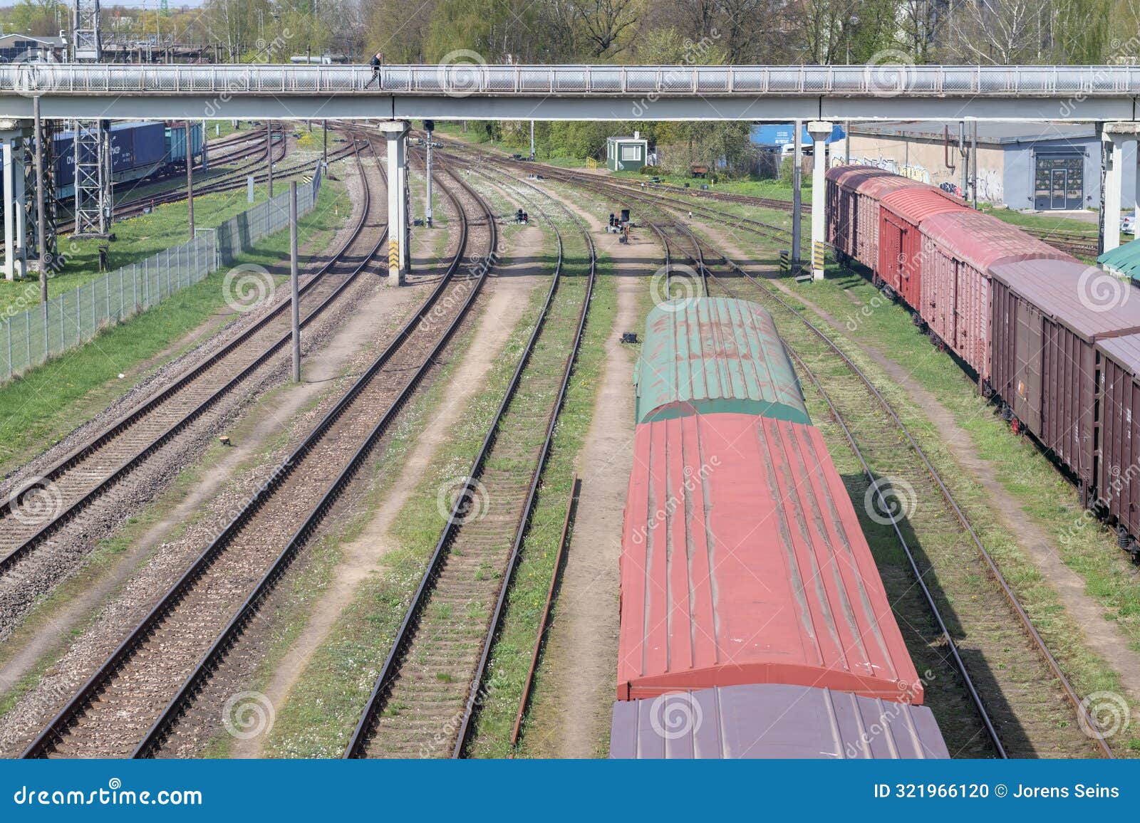 . Train on the Railway Tracks Going Around the Bend Stock Photo - Image ...