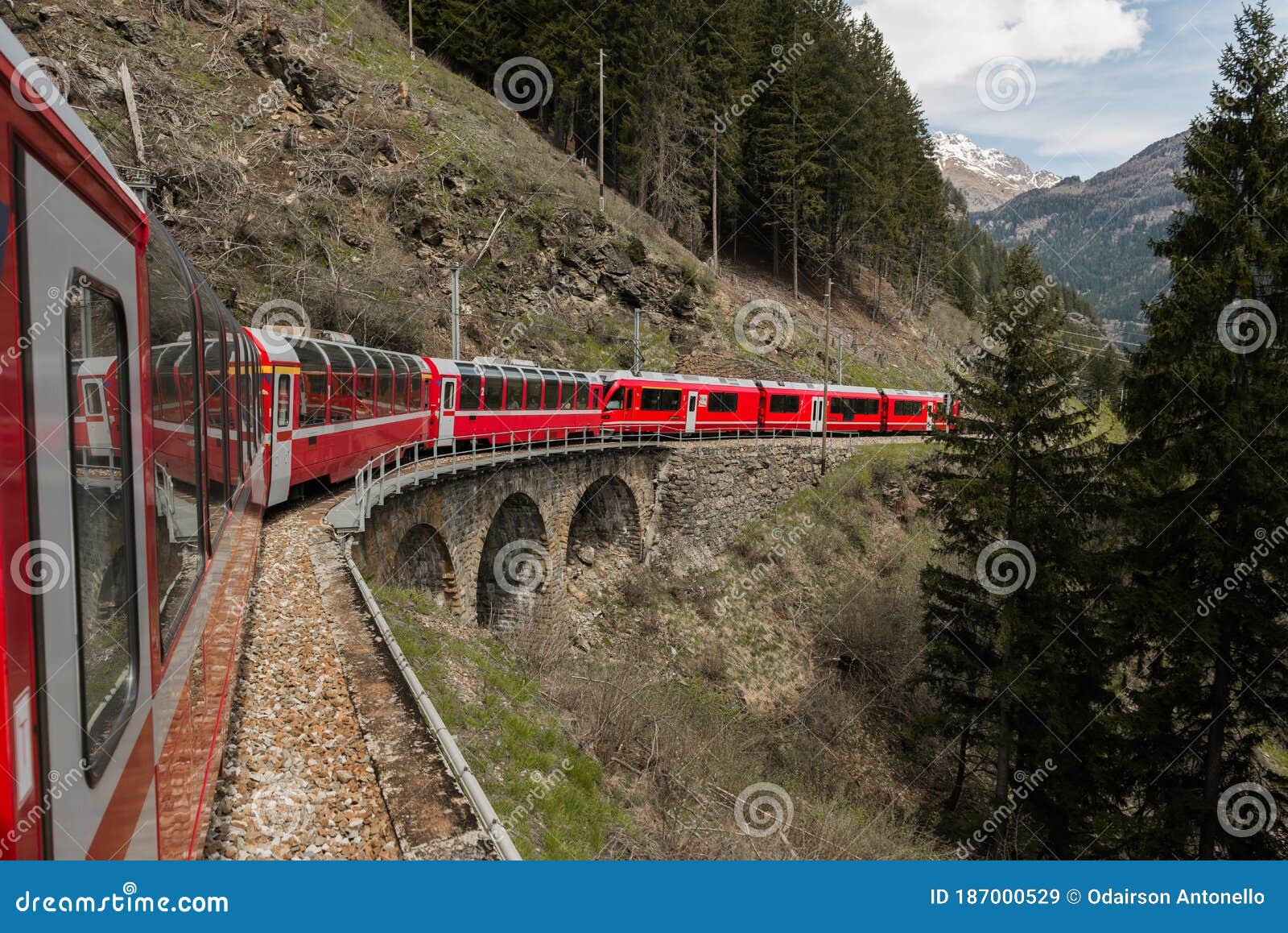 Train Ride in the Swiss Alps, with Company. Stock Image - Image of blue ...