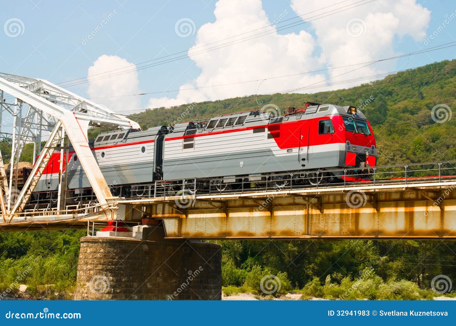 Train rides over bridge stock image. Image of region - 32941983